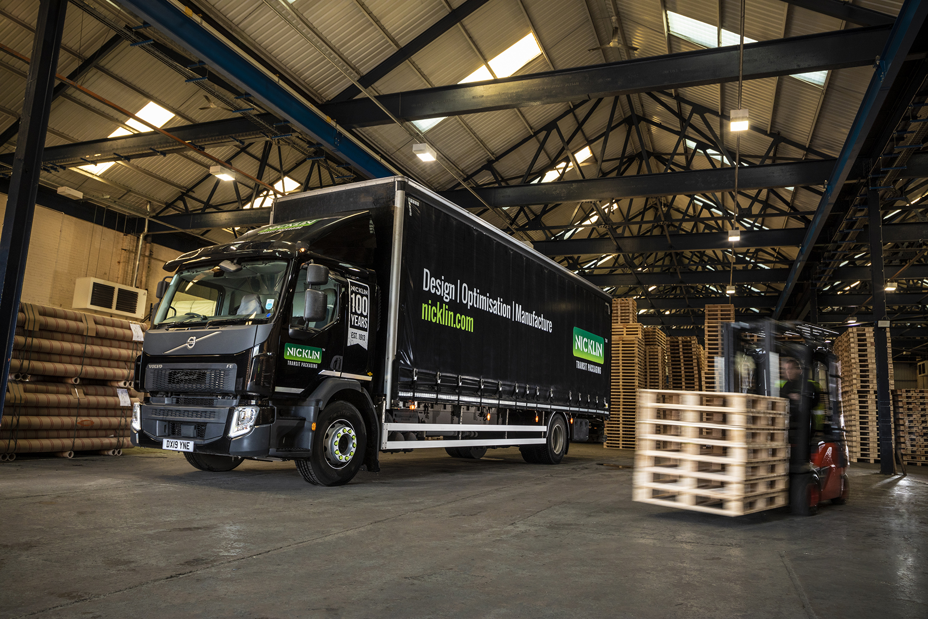 Five new Volvo FEs are fresh out of the box at Nicklin Transit Packaging